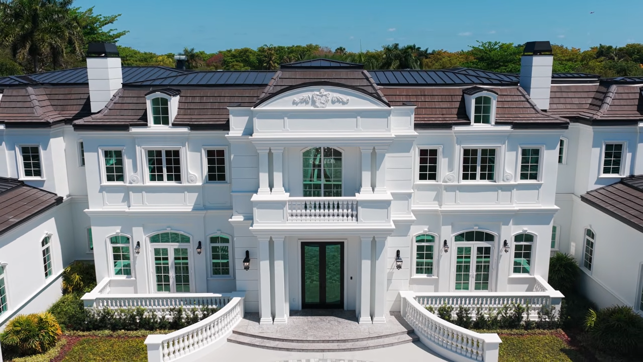 The $19.5M Florida mansion with a waterfall driveway and volleyball court