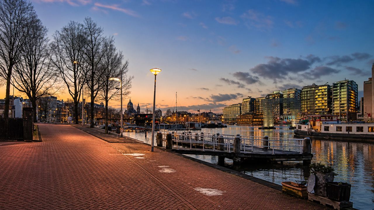Evening bike ride through Amsterdam with sunset city views