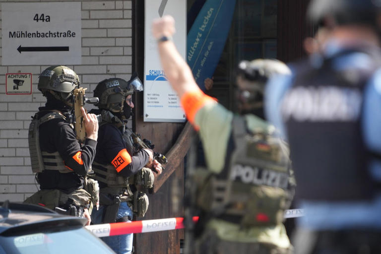 Police stand-off after several hostages taken in German bank