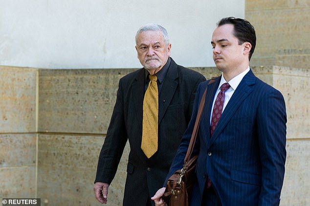 Dr Fauci's top aide's face says it all as he's booked in court on ...