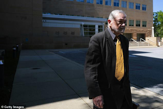 Dr Fauci's top aide's face says it all as he's booked in court on ...