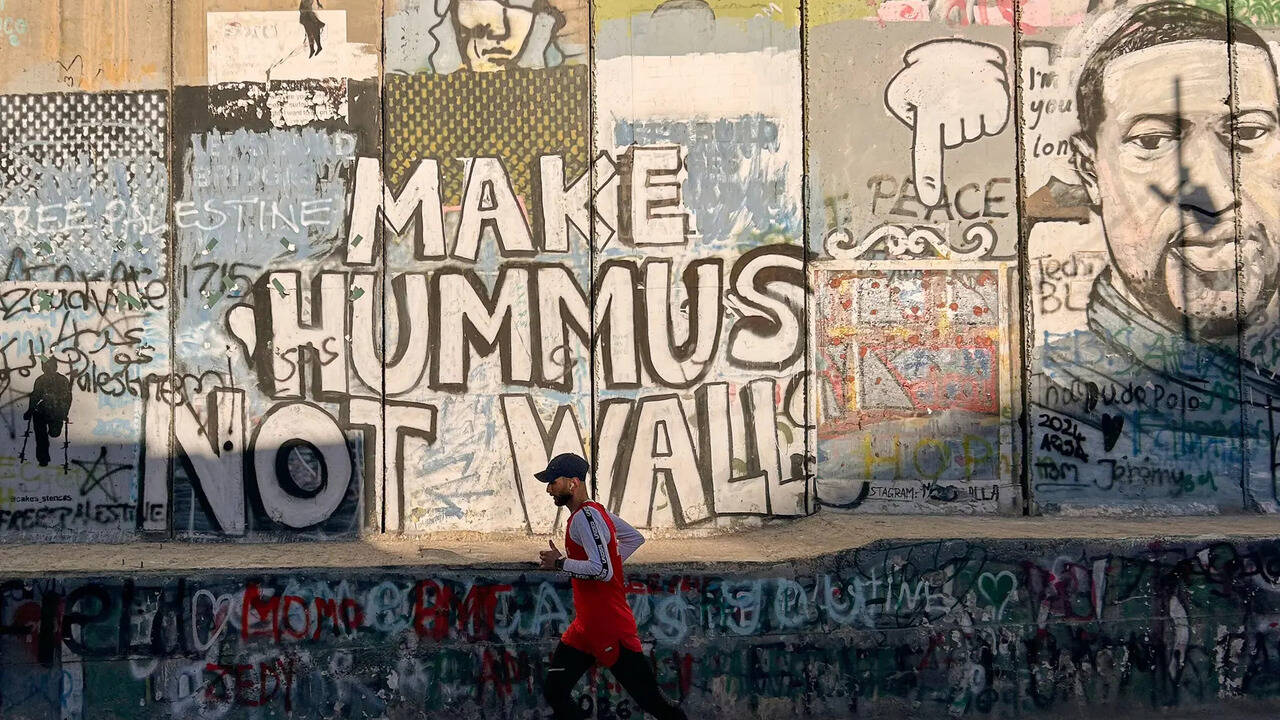 Palestinian runner celebrates marathon milestone after prison release