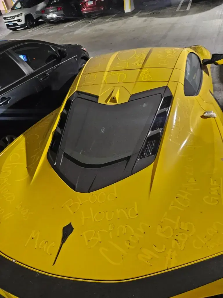 Abandoned C8 Corvette found covered in dust inside Miami hotel garage ...