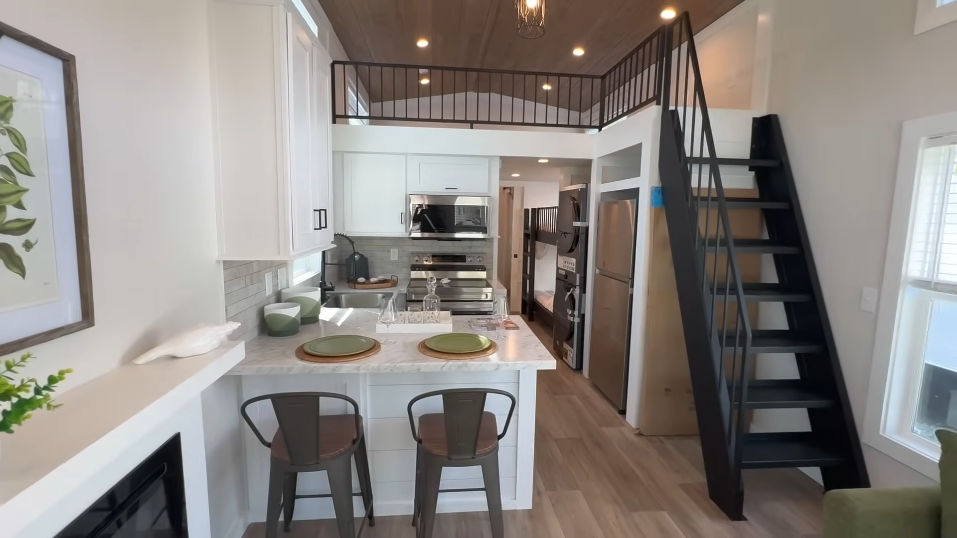 This tiny home sleeps more people than it has any right to