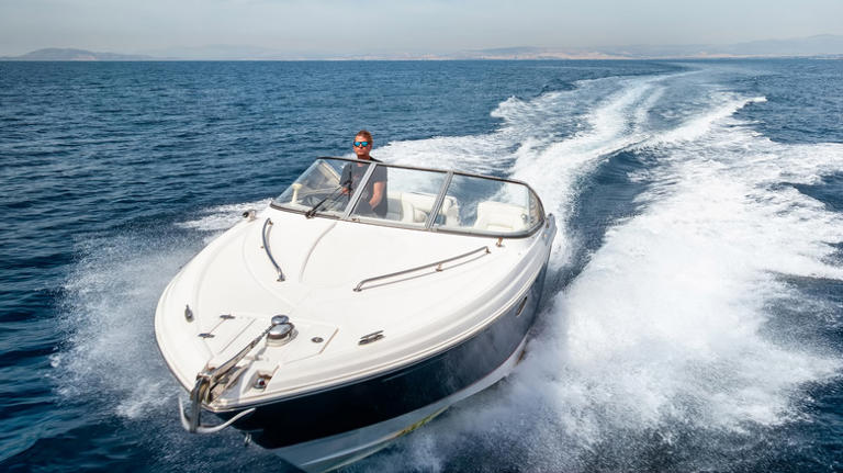 Why do most boats have steering wheels on the right side?