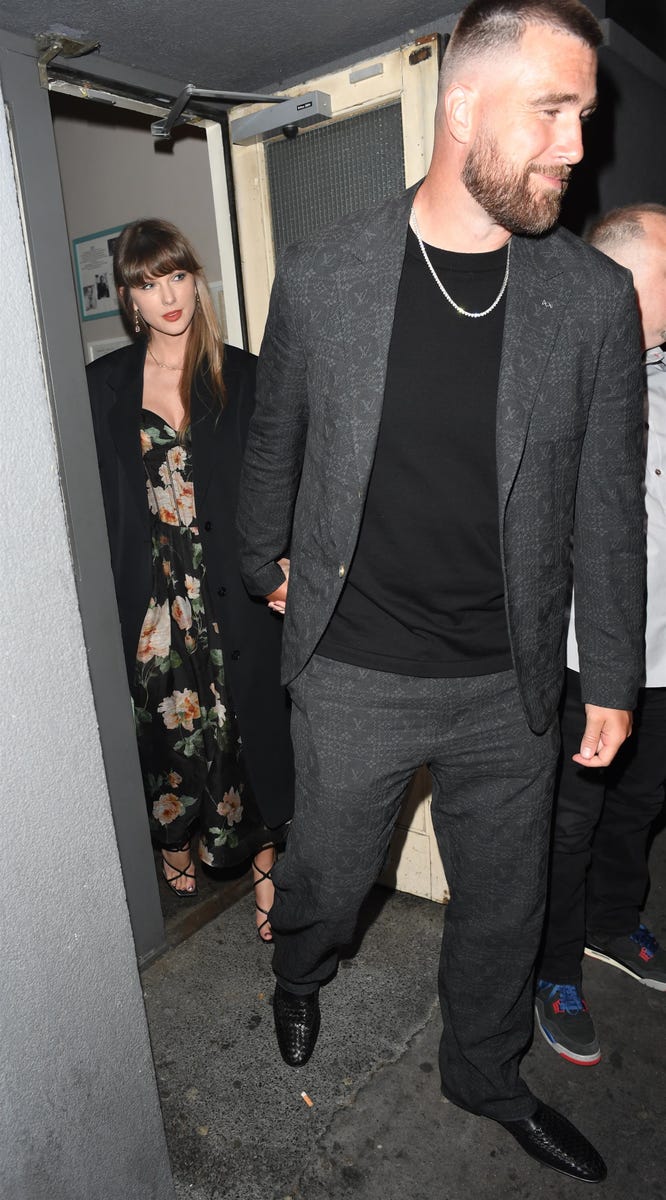 Taylor Swift’s black floral midi dress is perfect for a spring date night