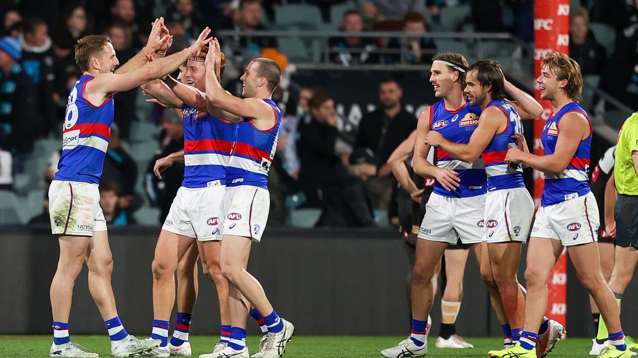 Bulldogs scrap tense win over Port in AFL thriller