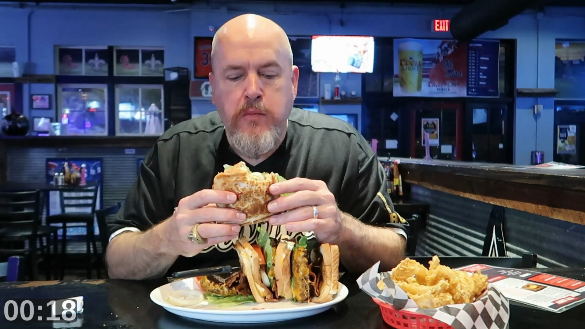 After a 28 inch pizza - he faced a giant 4 patty burger