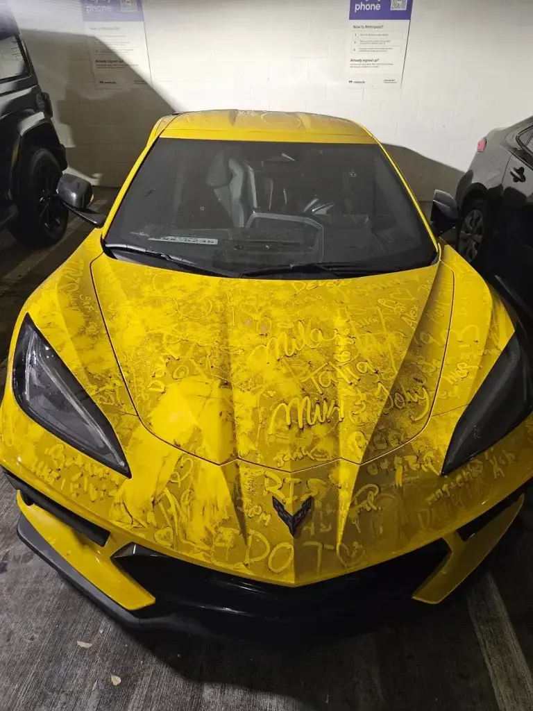Abandoned C8 Corvette found covered in dust inside Miami hotel garage ...