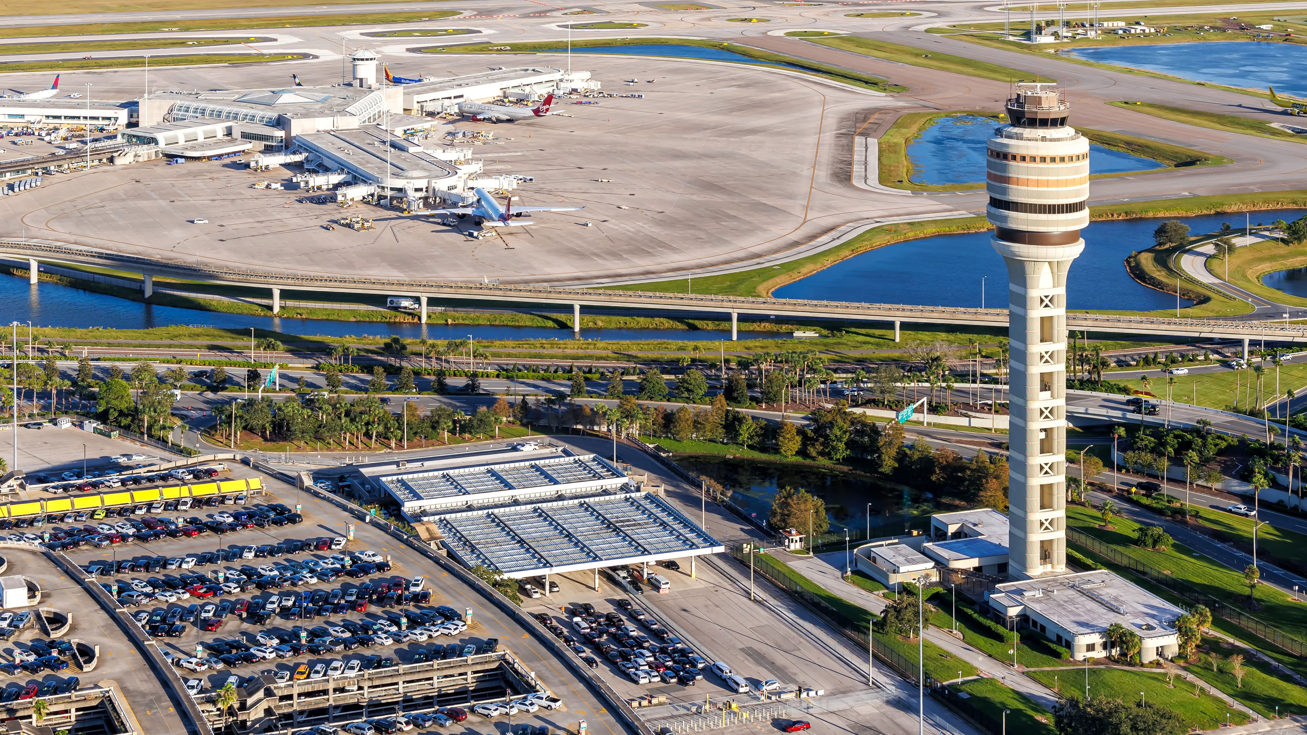 Delta worker dies when aircraft towing vehicle hits passenger bridge