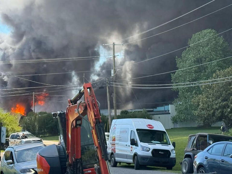 Massive factory fire underway in Henry, TN, crews continuing to battle ...