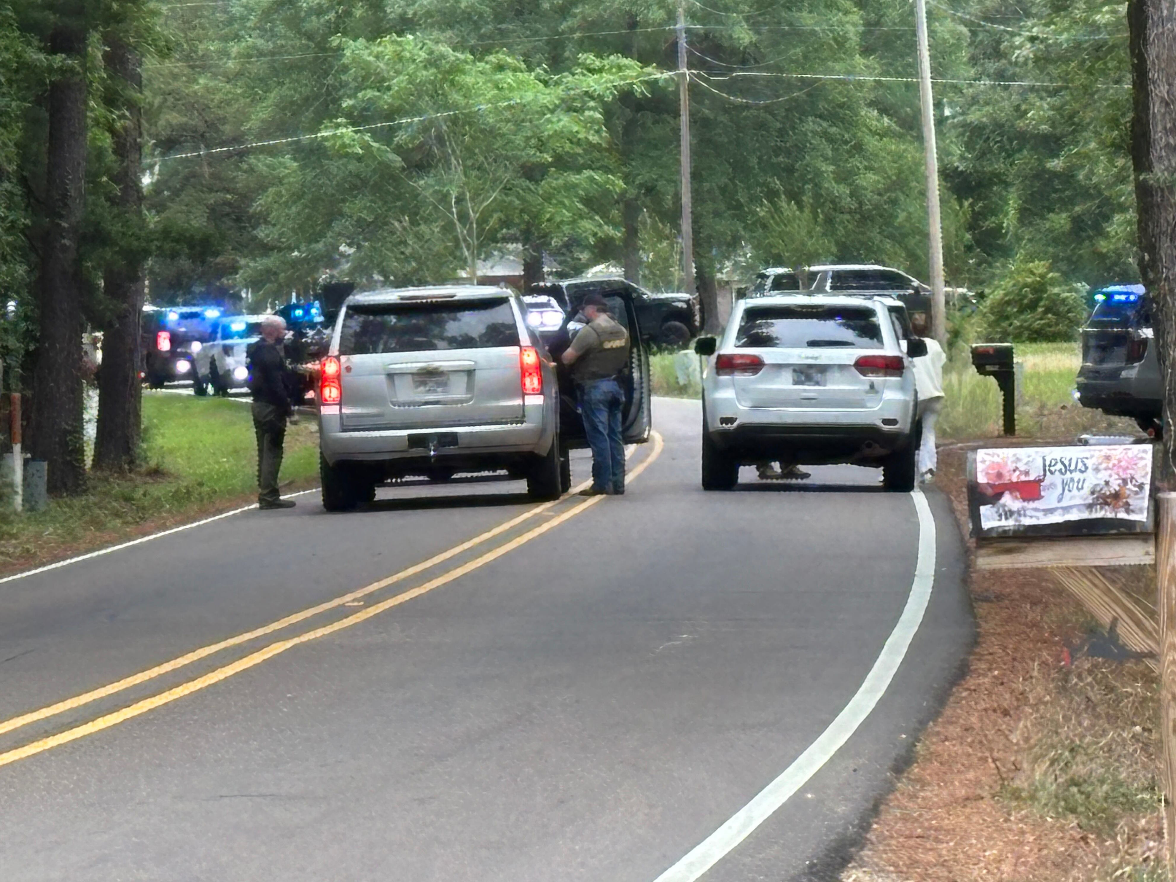 Two people shot and killed, suspect dead after barricading inside home