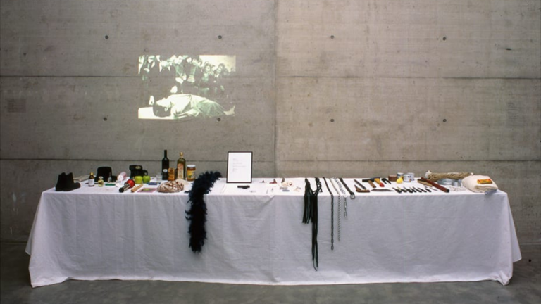 Woman stood motionless for six hours and let people use 72 objects on ...