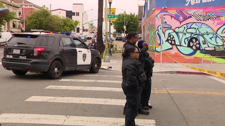 Oakland police shoot suspect after he drags officers with car, pins one