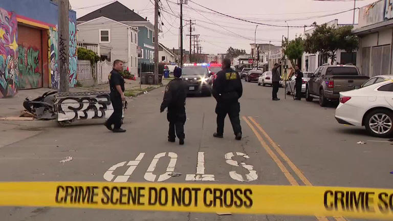 Oakland police shoot suspect after he drags officers with car, pins one