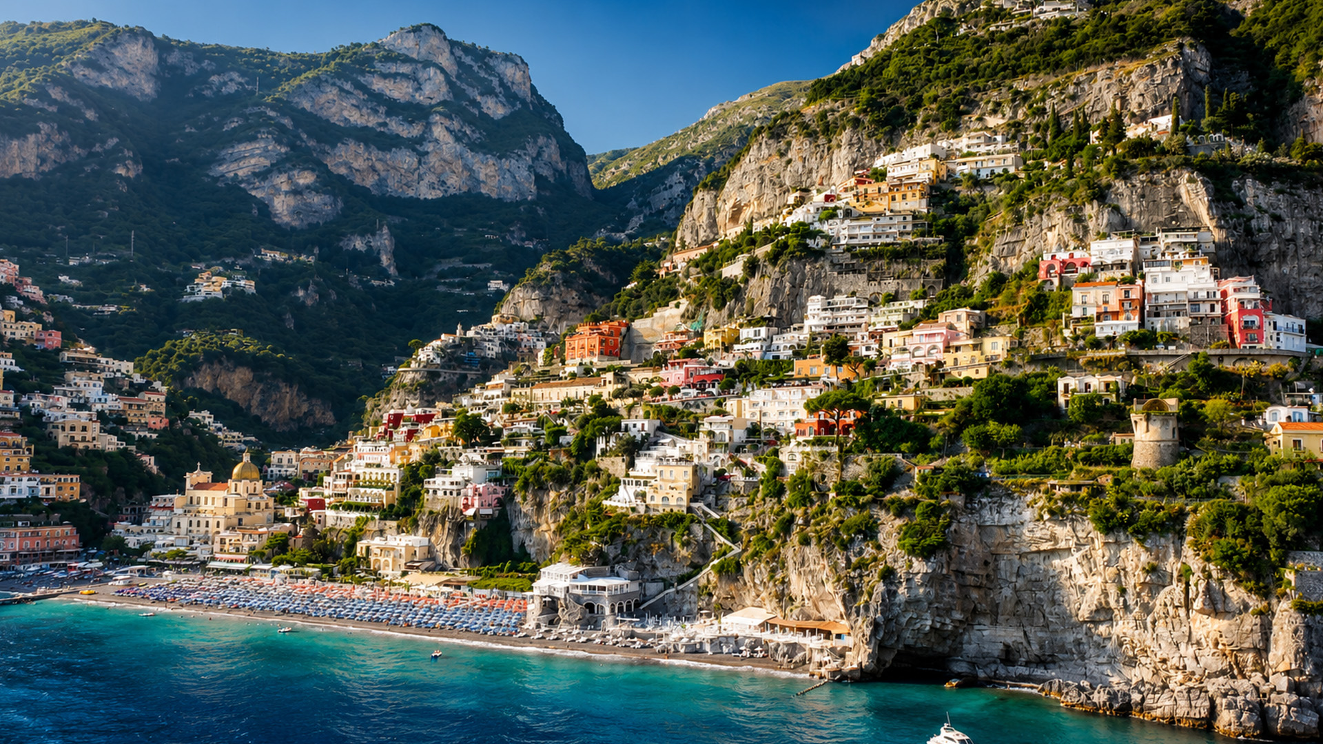 Colorful buildings cover these steep mountainsides