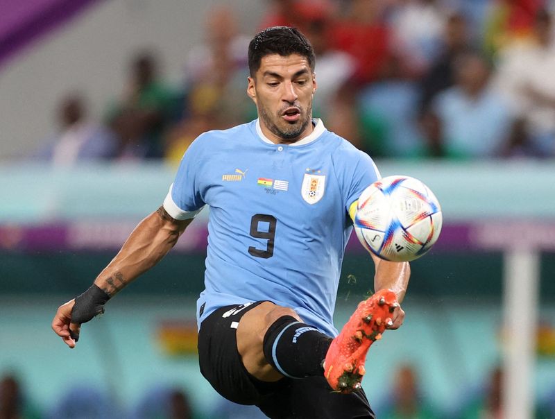 Soccer-Suarez open to Uruguay return for World Cup