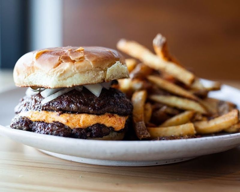 This Indiana spot serves hand-pressed smash burgers for $5, but only if ...