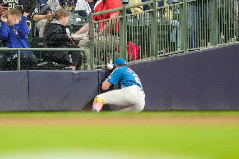 Brewers outfielder Brandon Lockridge carted off after suffering 'pretty ...