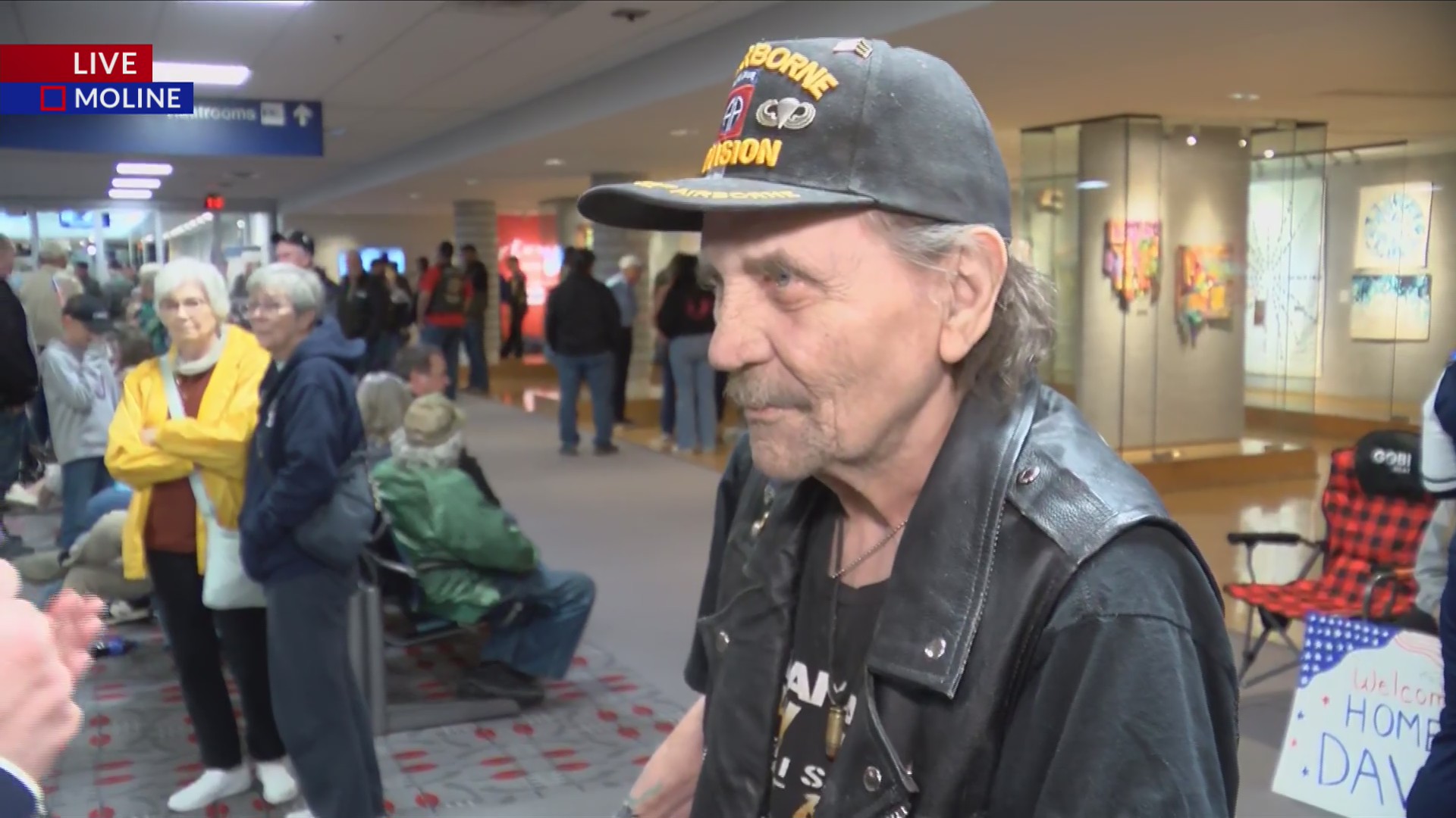 Guy welcomes home veterans on Honor Flight