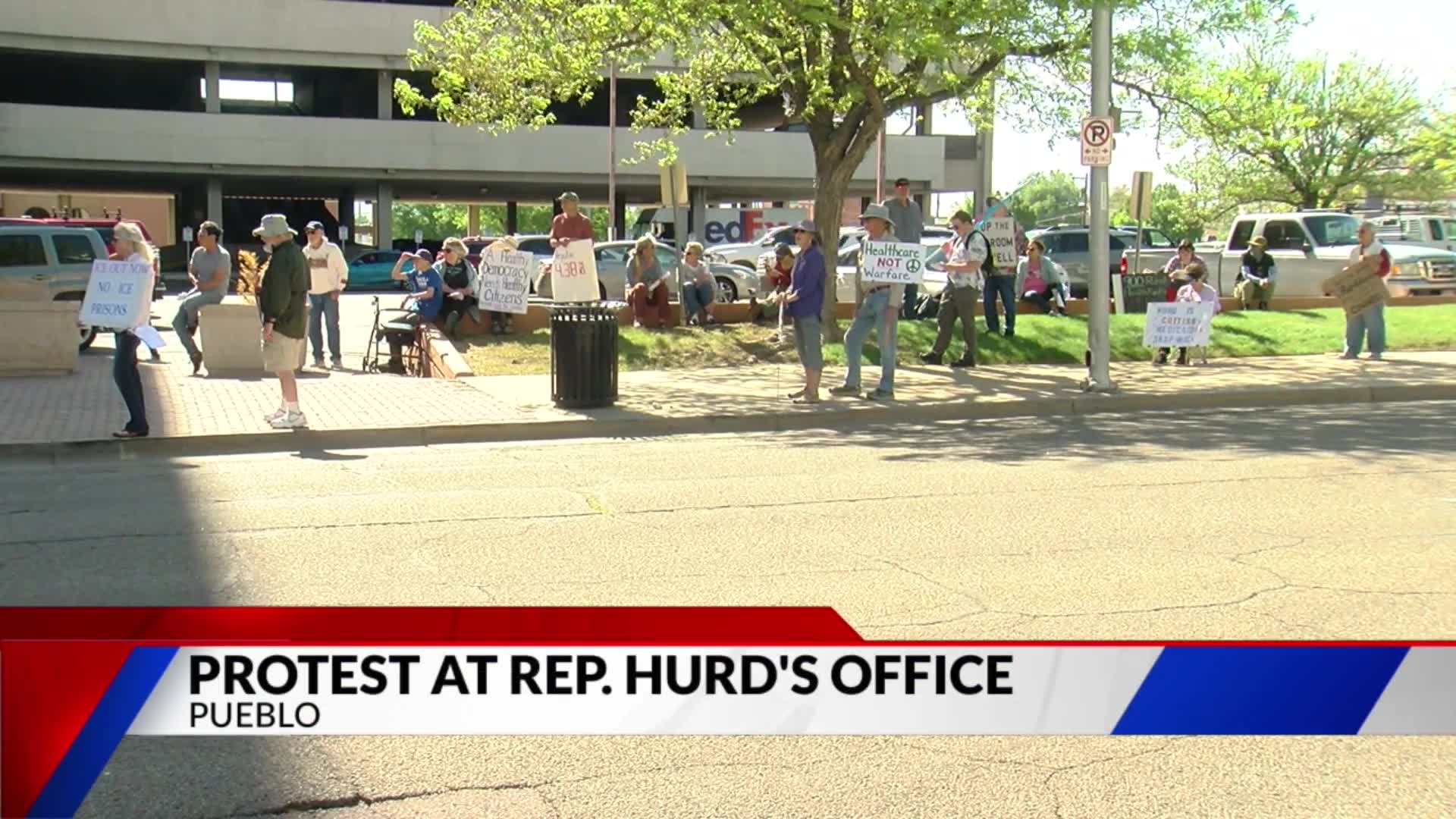 Protestors gather outside Jeff Hurd's office in Pueblo
