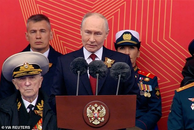 No tanks, we're at war! Putin oversees stripped-down Victory Day parade ...