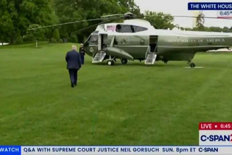 Trump 'zigzags' towards Marine One amid 'struggle' to walk in straight line