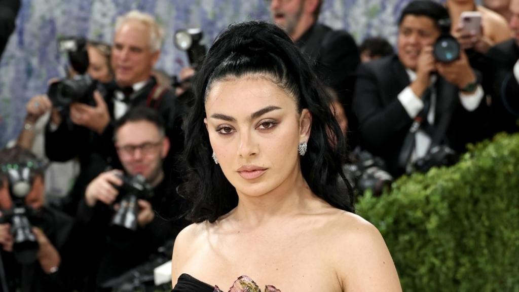 Charli XCX's Zana Bayne lacy lingerie has matching neck brace & garters
