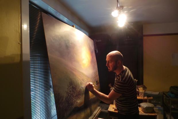 Local artist paints picture to raise funds for wildlife charity