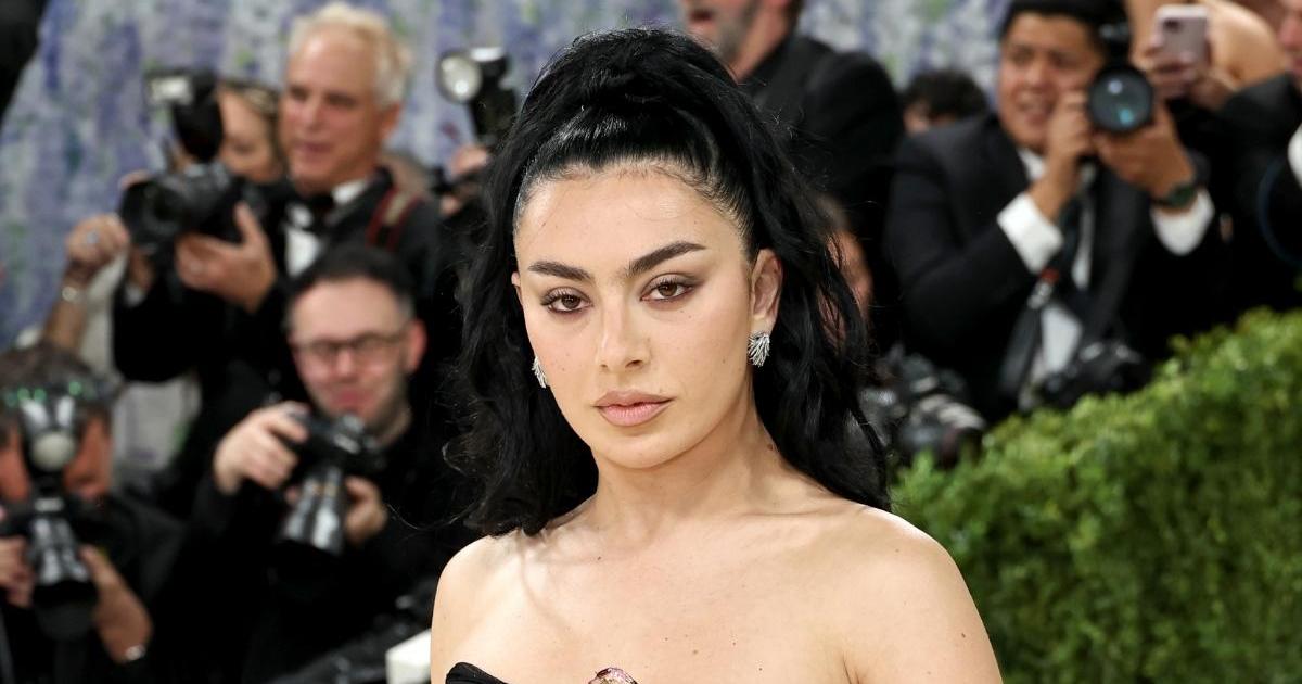 Charli XCX's Zana Bayne lacy lingerie has matching neck brace & garters