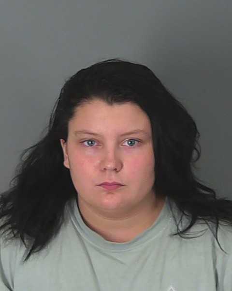 Two charged after body found in burning car on railroad tracks ...