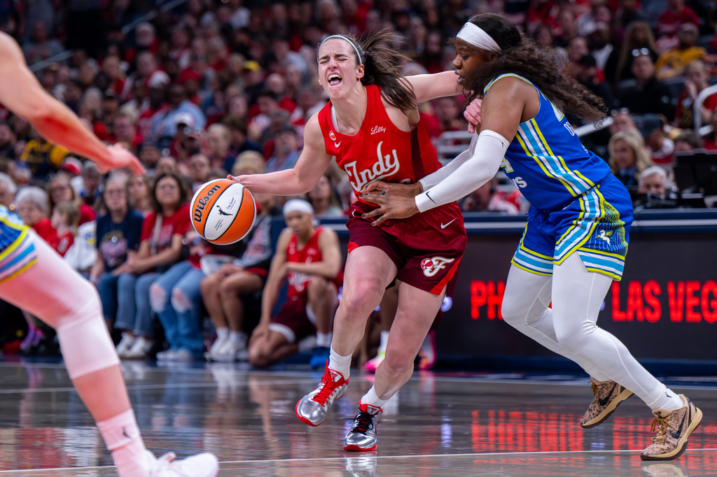 Ogunbowale and Bueckers hold off Clark's Fever as Wings win highly ...