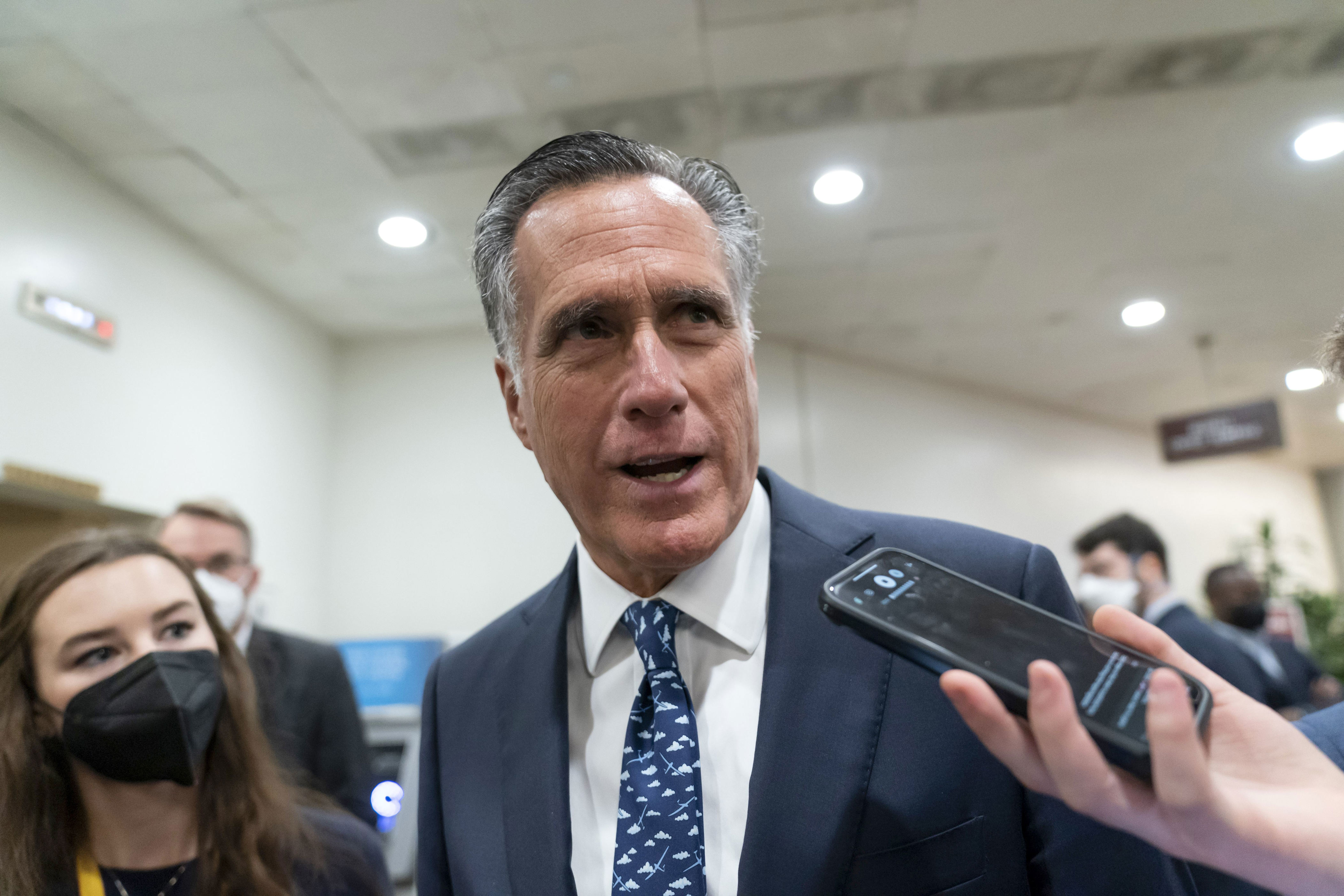 Romney resurfaces to back ally