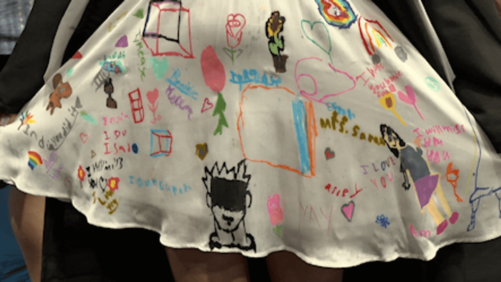 CCU education grad wears dress decorated by her students at commencement