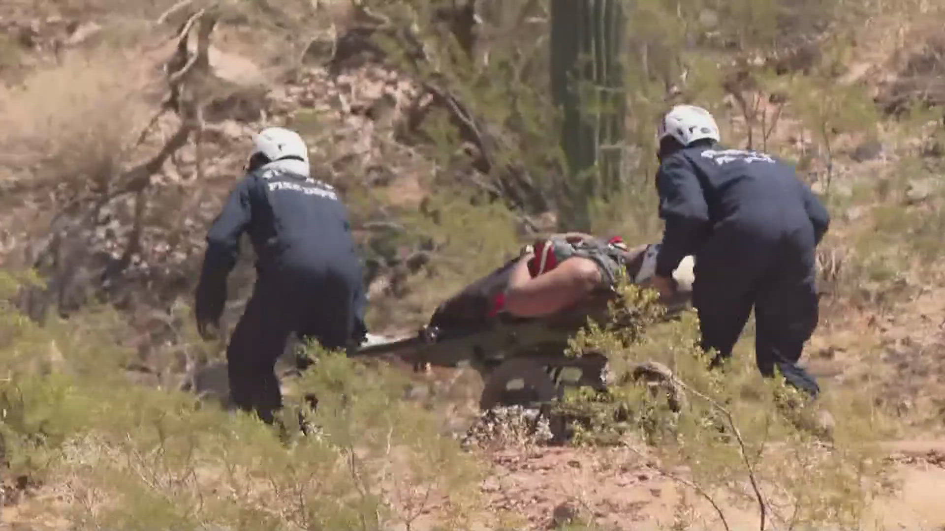 Fire crews rescue 2 people off Camelback Mountain as temperatures rise ...