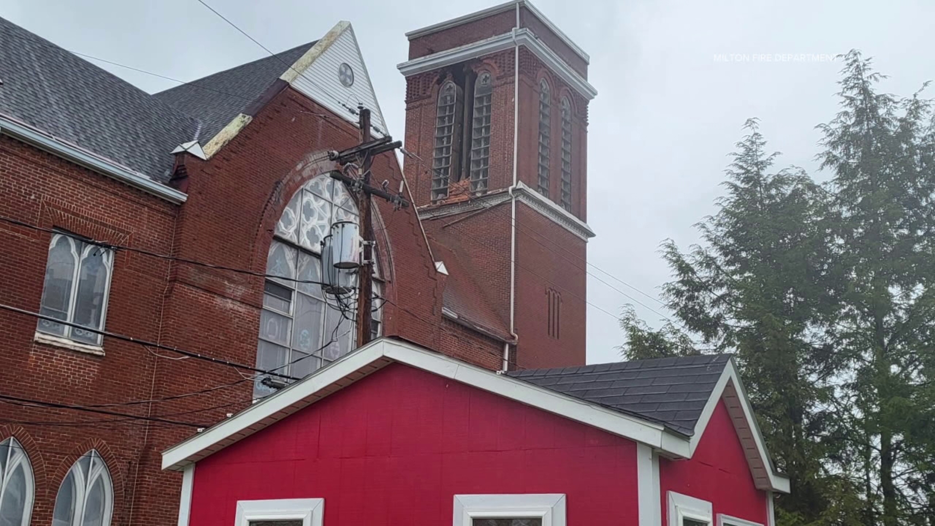 Road is closed after parts of a church collapsed in Milton, officials say