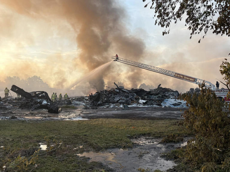 Massive factory fire almost fully extinguished after firefighters ...