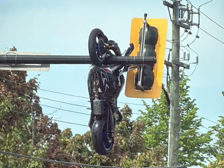 Delta crash sends motorcyclist to hospital, leaves bike suspended in ...