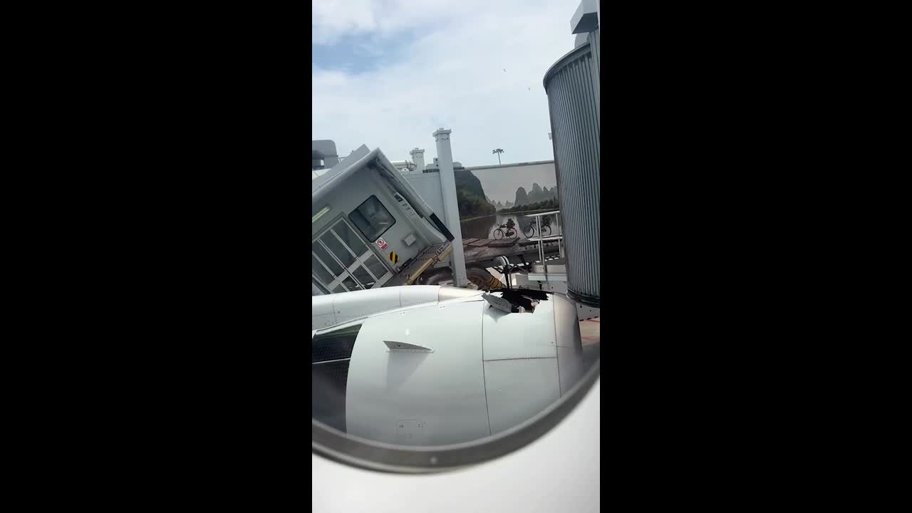 Plane collides with jet bridge at Shanghai airport after landing