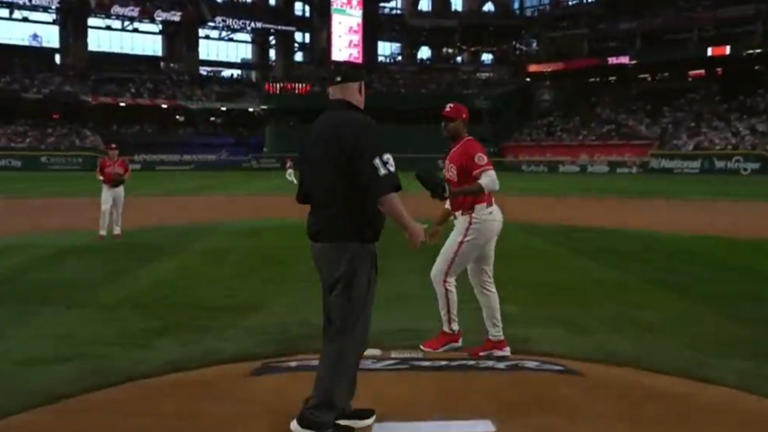 MLB: Umpires force Rangers pitcher to change outfit mid-game
