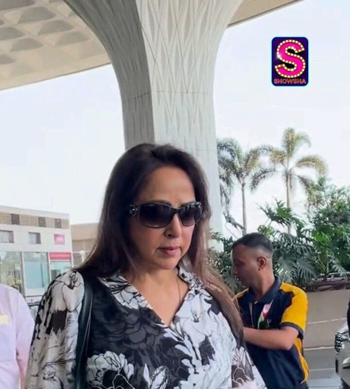 The iconic Hema Malini brings unmatched elegance to the airport! # ...