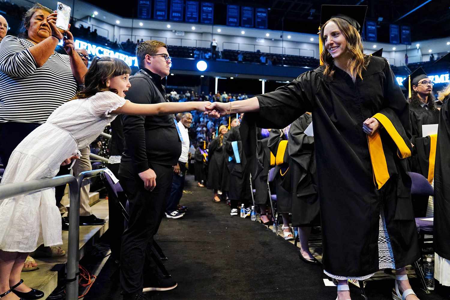 Single mom of 11 earns master’s degree after overcoming hearing loss