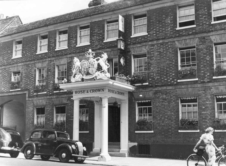 Historic entrance of Tonbridge High Street’s Rose and Crown Hotel poses ...