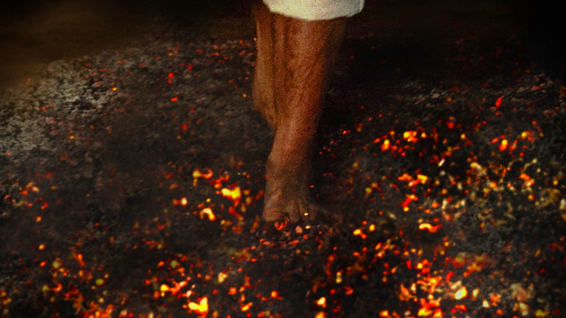 Fire walkers defy laws of physics