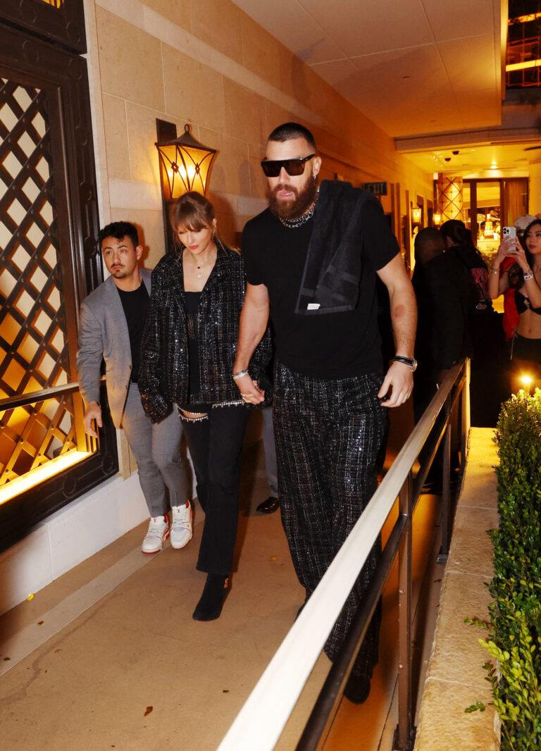 Taylor Swift turns heads in little black lace outfit for date night ...