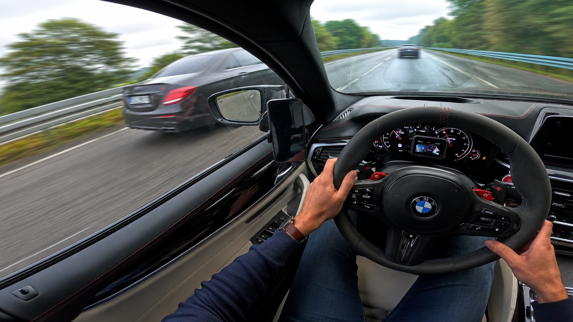 BMW M5 Evolve Stage 2 vs AMG E63 S in autobahn driving