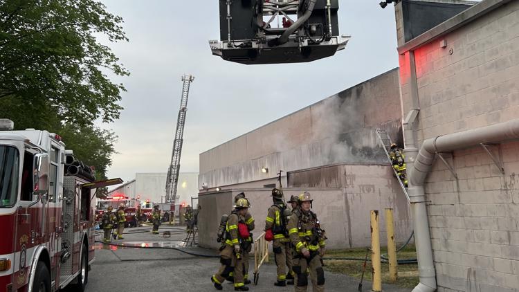 Dumpster fire damages back of Norfolk Pep Boys building, officials say