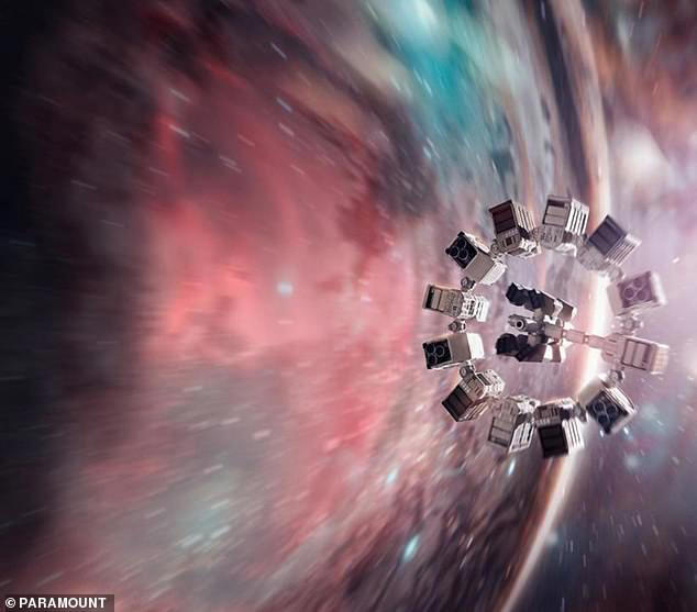 Scientists claim dark matter may have created a wormhole inside the ...
