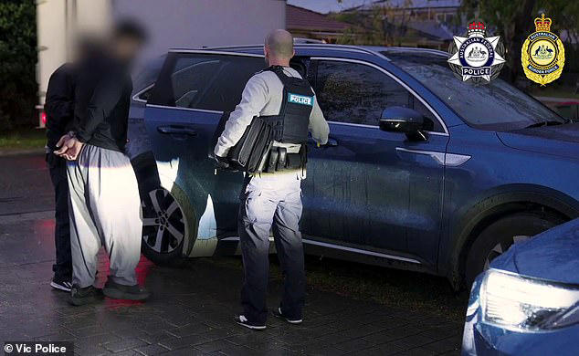 Four arrested as authorities swoop on group in Melbourne accused of ...