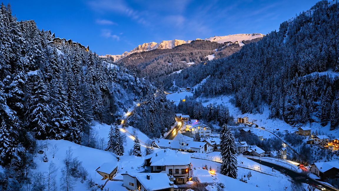 Winter lights glowing through the frozen valley